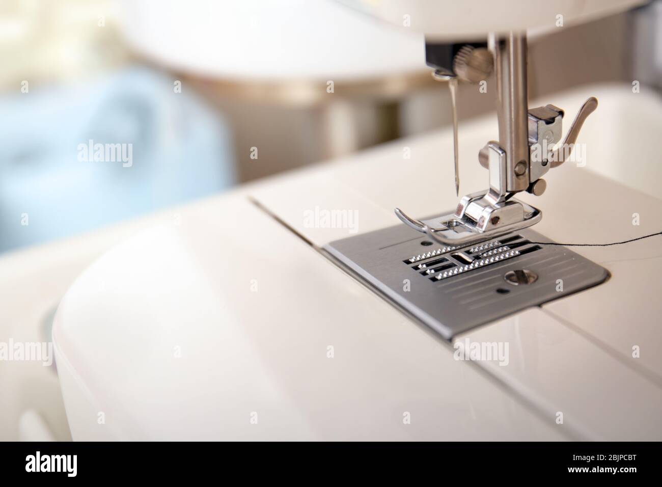 New sewing machine, closeup Stock Photo - Alamy