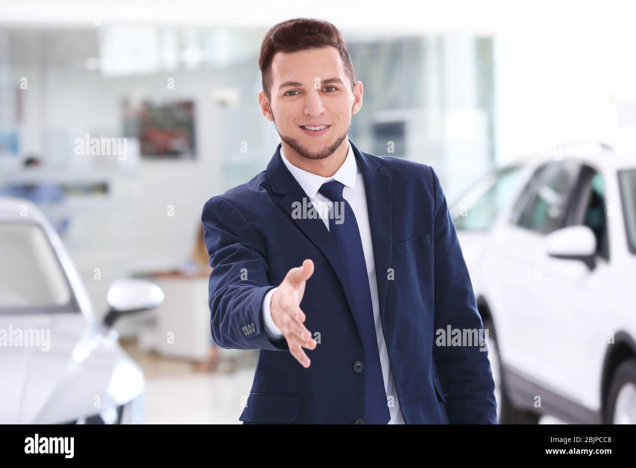 Car salesman in dealership hi-res stock photography and images - Alamy