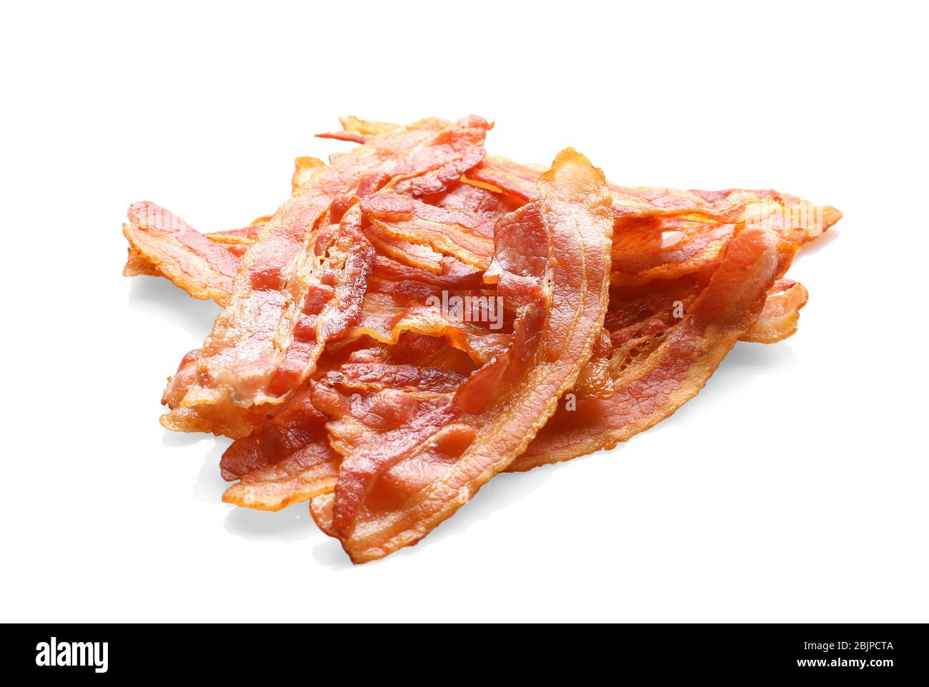 Cooked bacon rashers on white background Stock Photo - Alamy