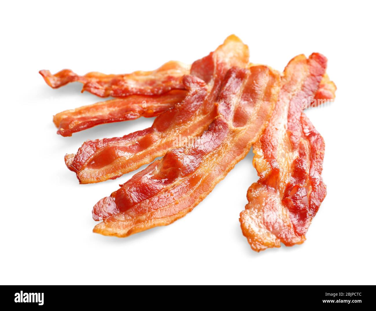 Cooked bacon rashers on white background Stock Photo - Alamy