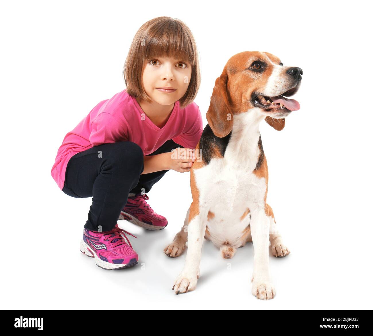 Cute little girl with dog on white background Stock Photo - Alamy