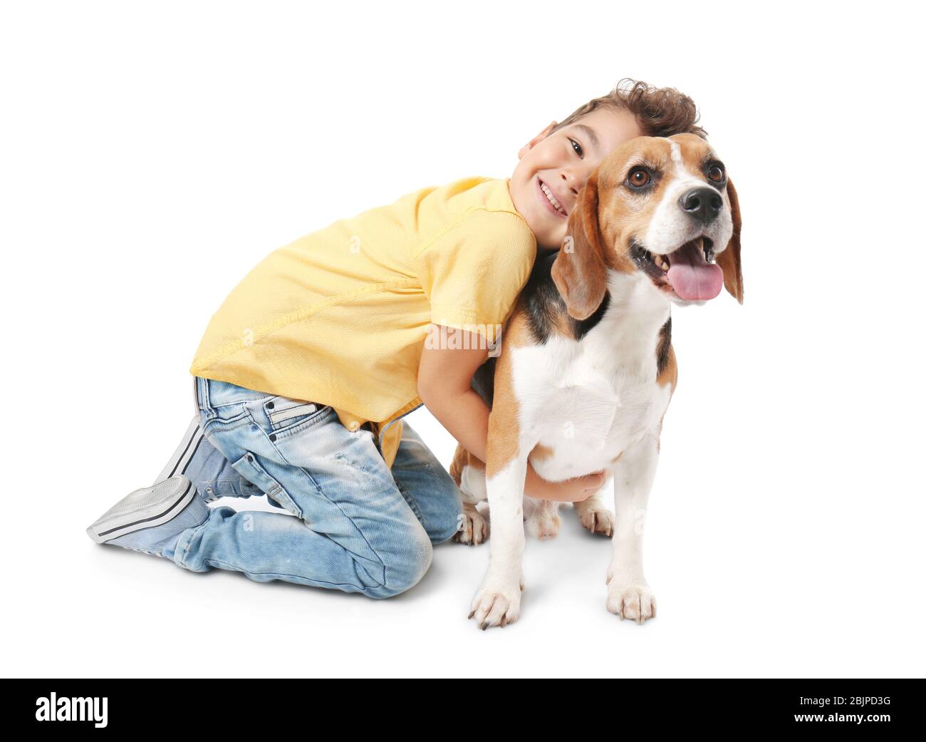 Cute little boy with dog on white background Stock Photo - Alamy