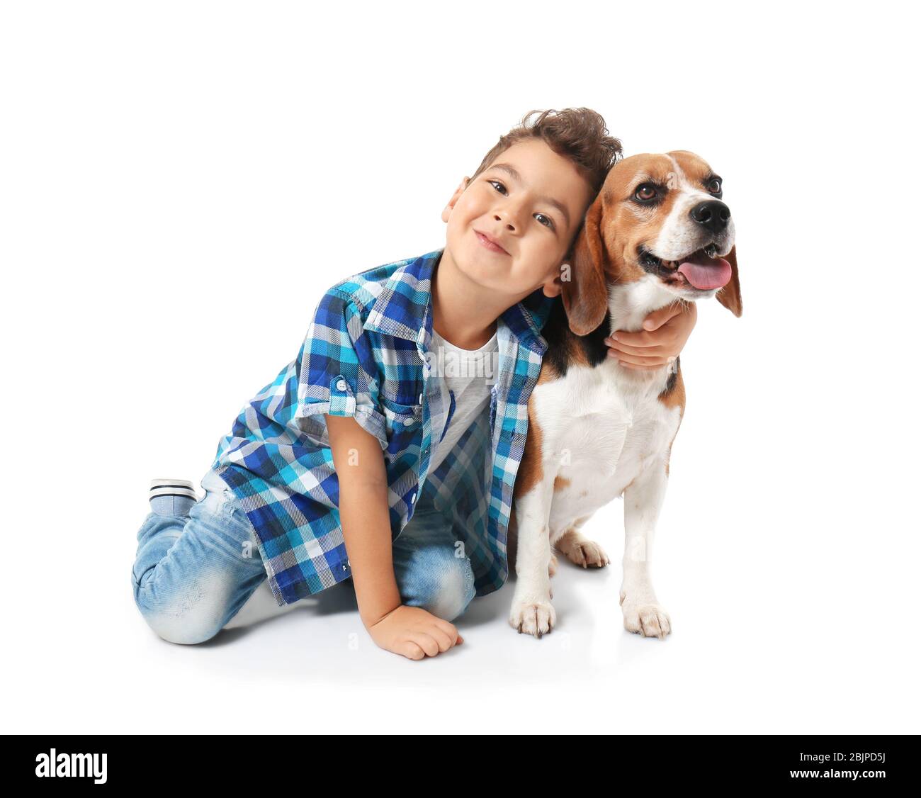 Cute little boy with dog on white background Stock Photo - Alamy