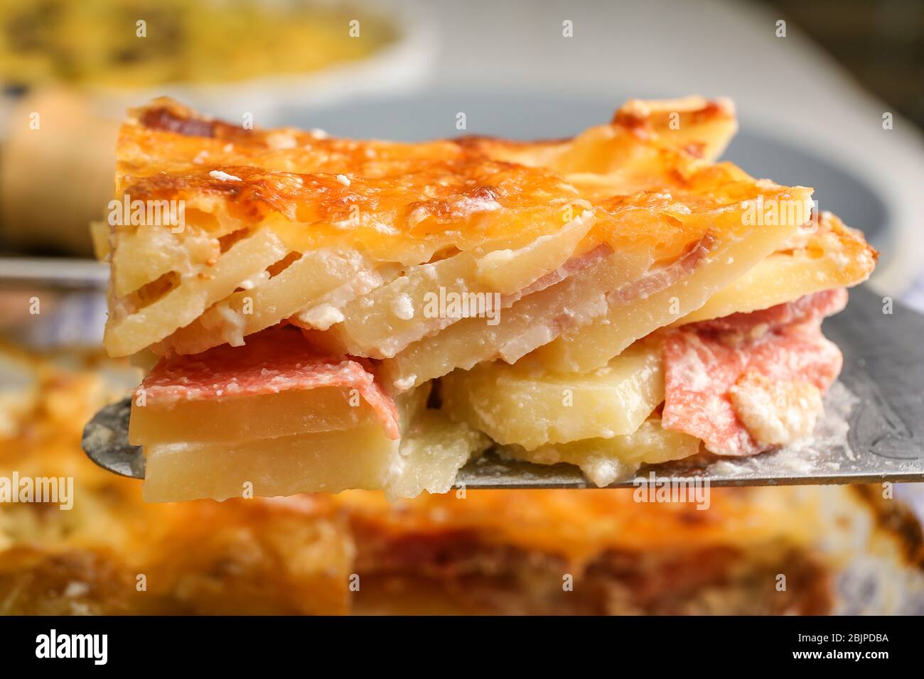 Spatula potato casserole closeup hi-res stock photography and images ...