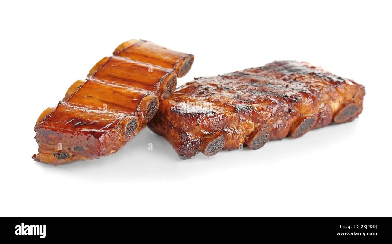Delicious grilled ribs on white background Stock Photo - Alamy