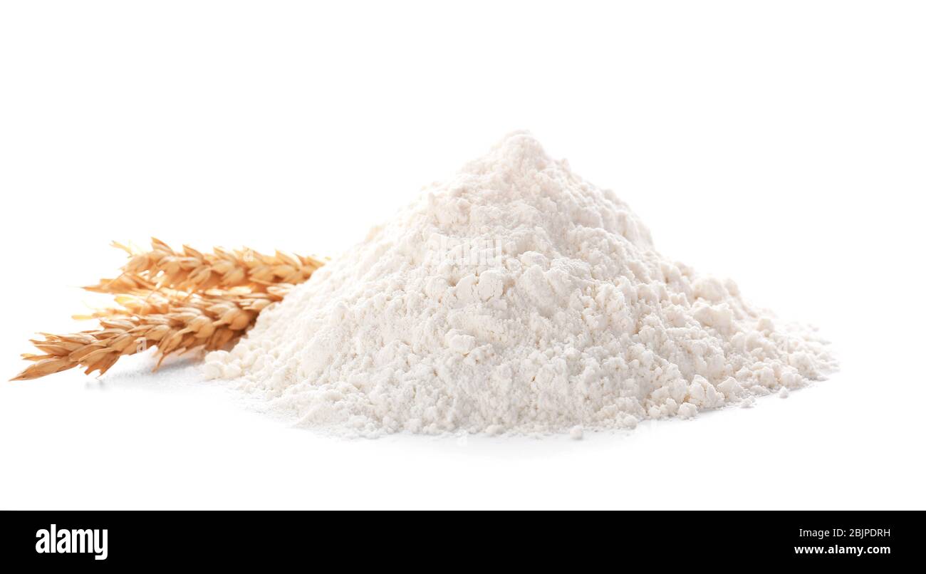 Heap of flour on white background Stock Photo - Alamy
