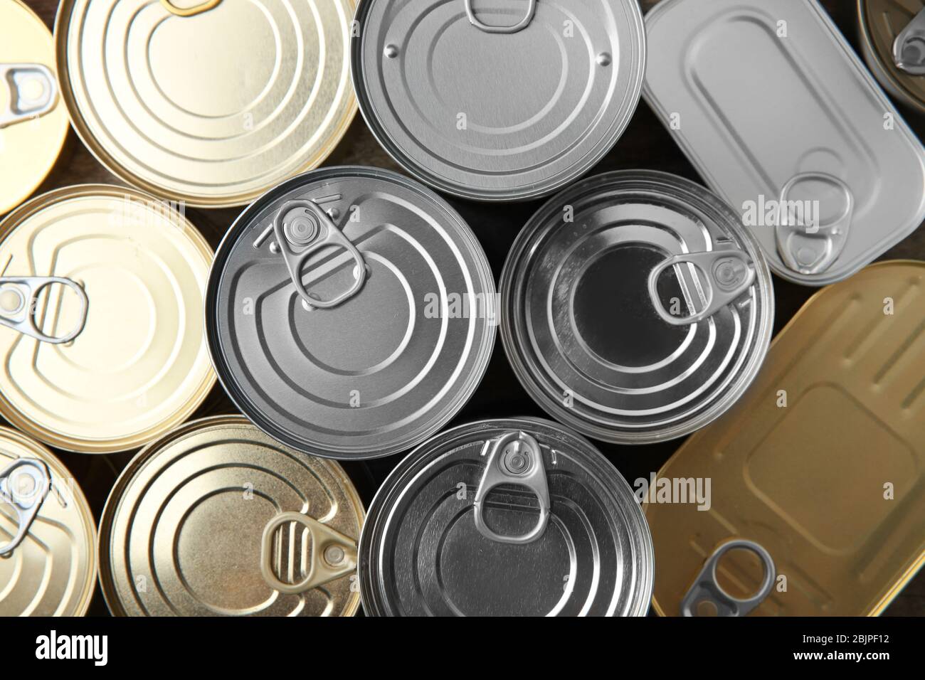 Tin cans as background Stock Photo - Alamy