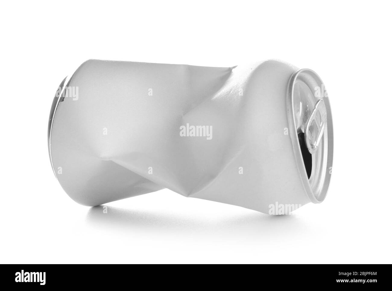 Crumpled empty can, isolated on white Stock Photo - Alamy