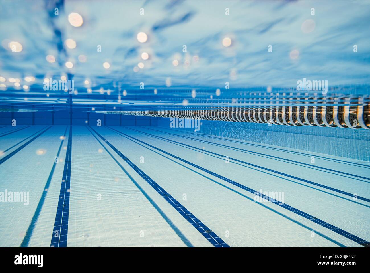 Olympic Swimming pool underwater background Stock Photo - Alamy