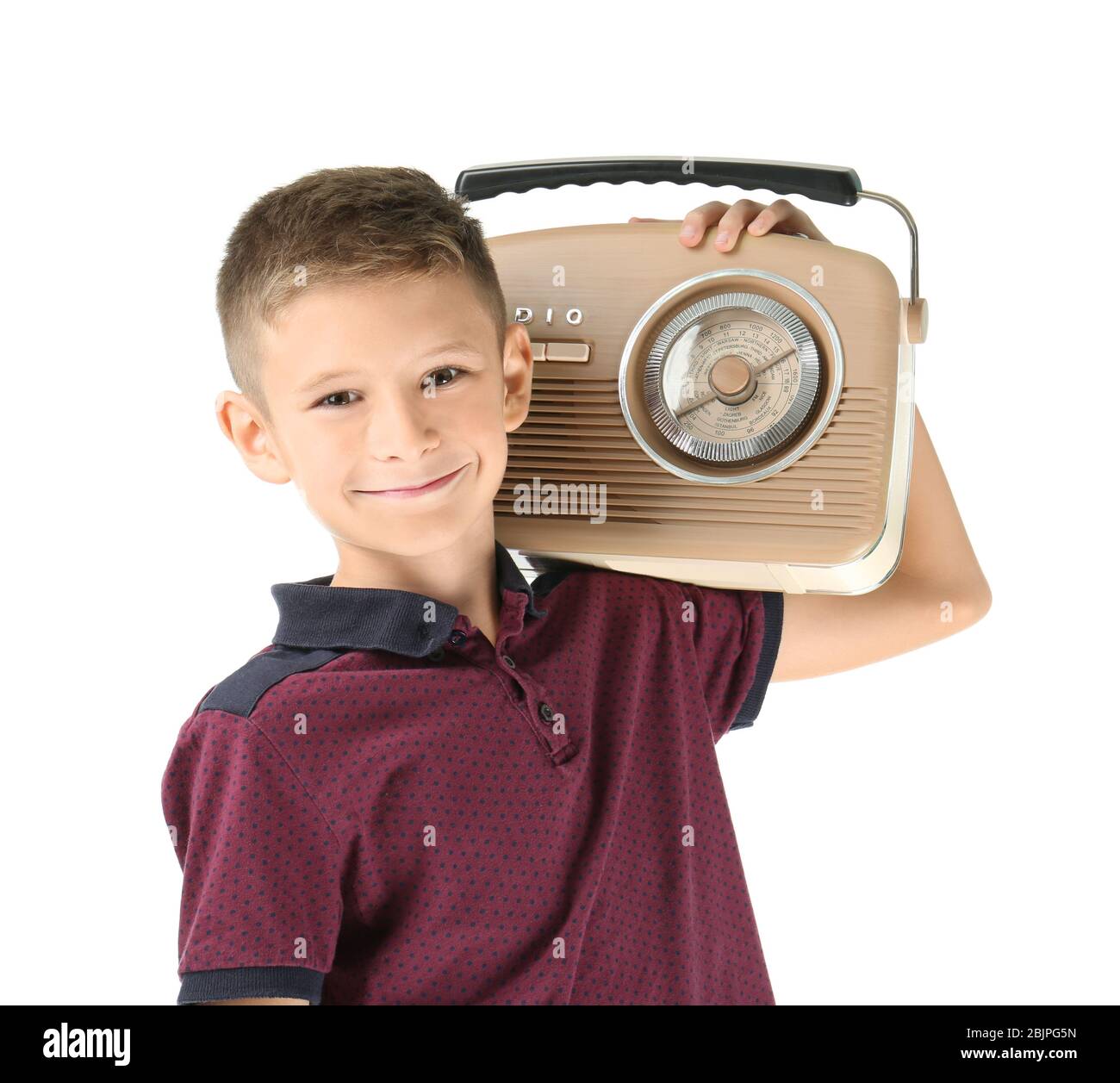 Adorable little boy with vintage radio on white background Stock Photo ...