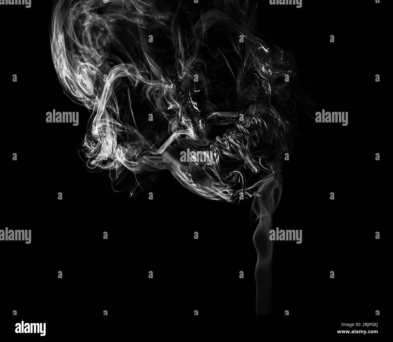 Cigarette smoke forming a skull shape Stock Photo - Alamy