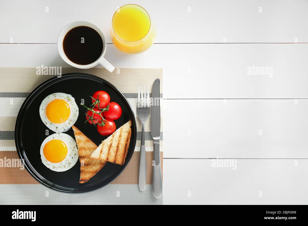 Composition with traditional English breakfast on table Stock Photo - Alamy