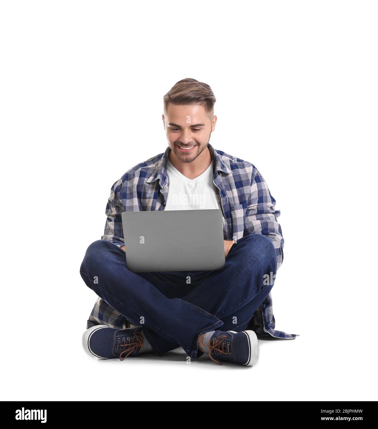 Man shopping online using laptop Cut Out Stock Images & Pictures - Alamy