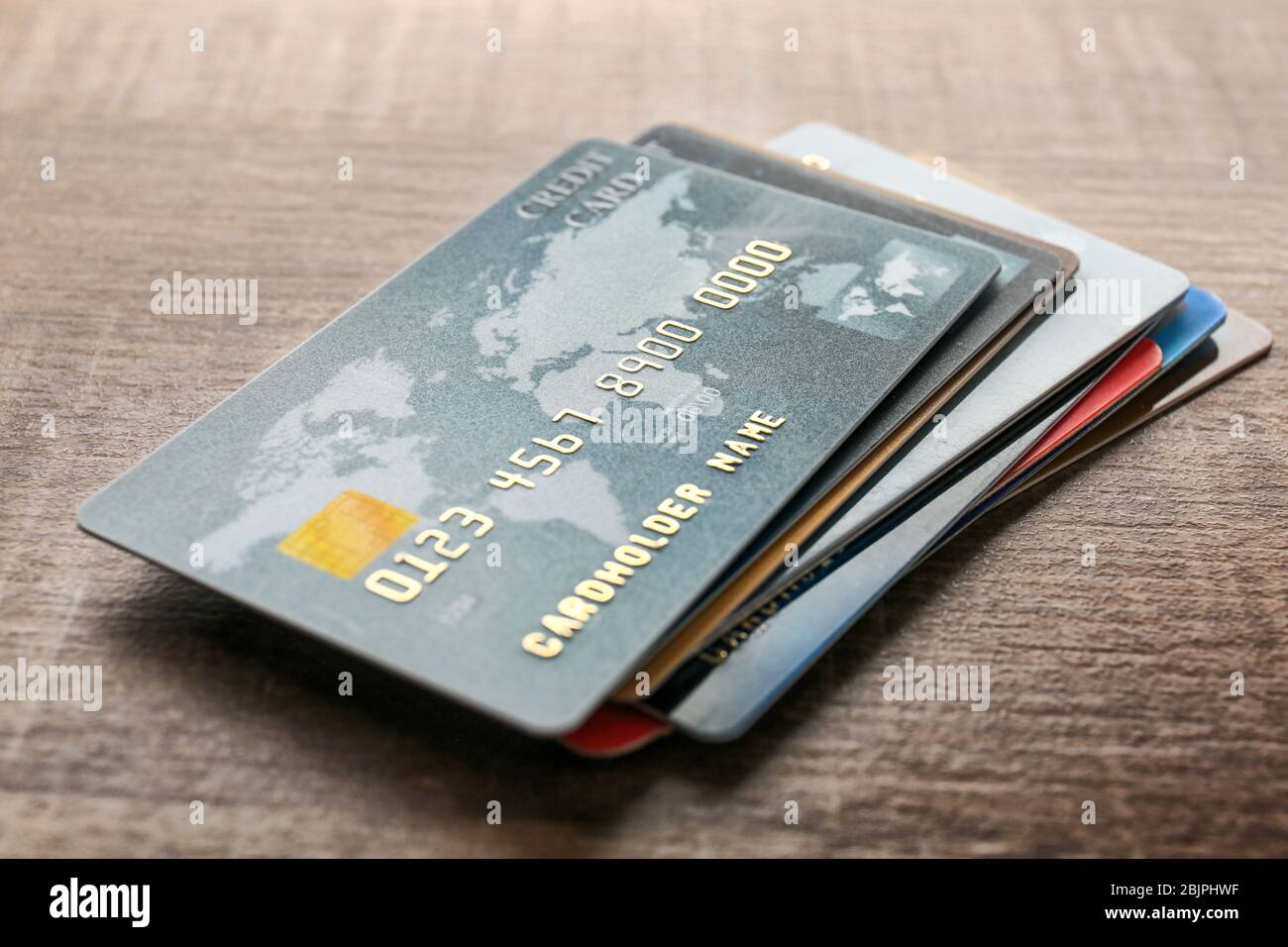Pile of credit cards on table, closeup Stock Photo - Alamy