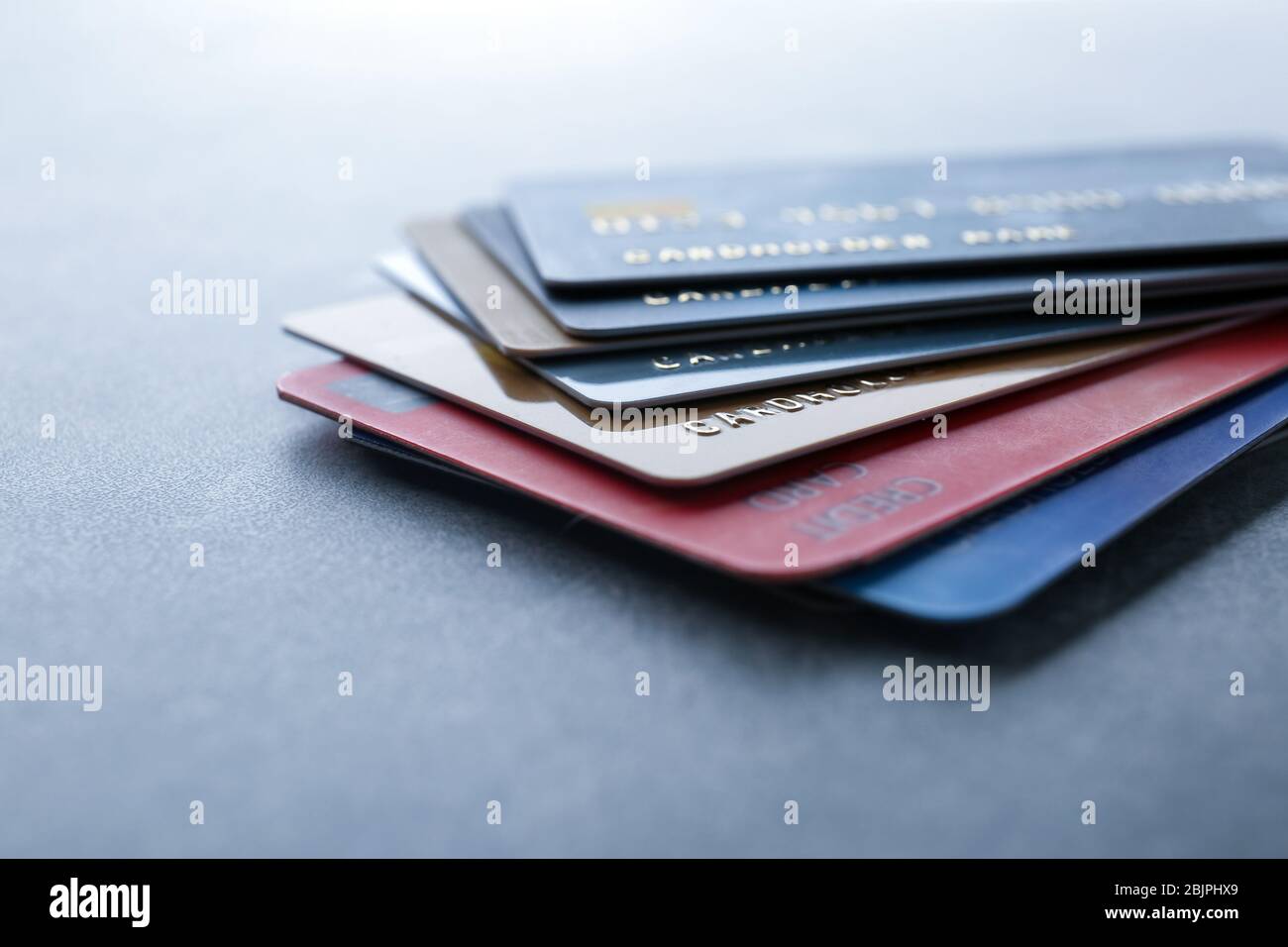 Pile of credit cards on table, closeup Stock Photo - Alamy