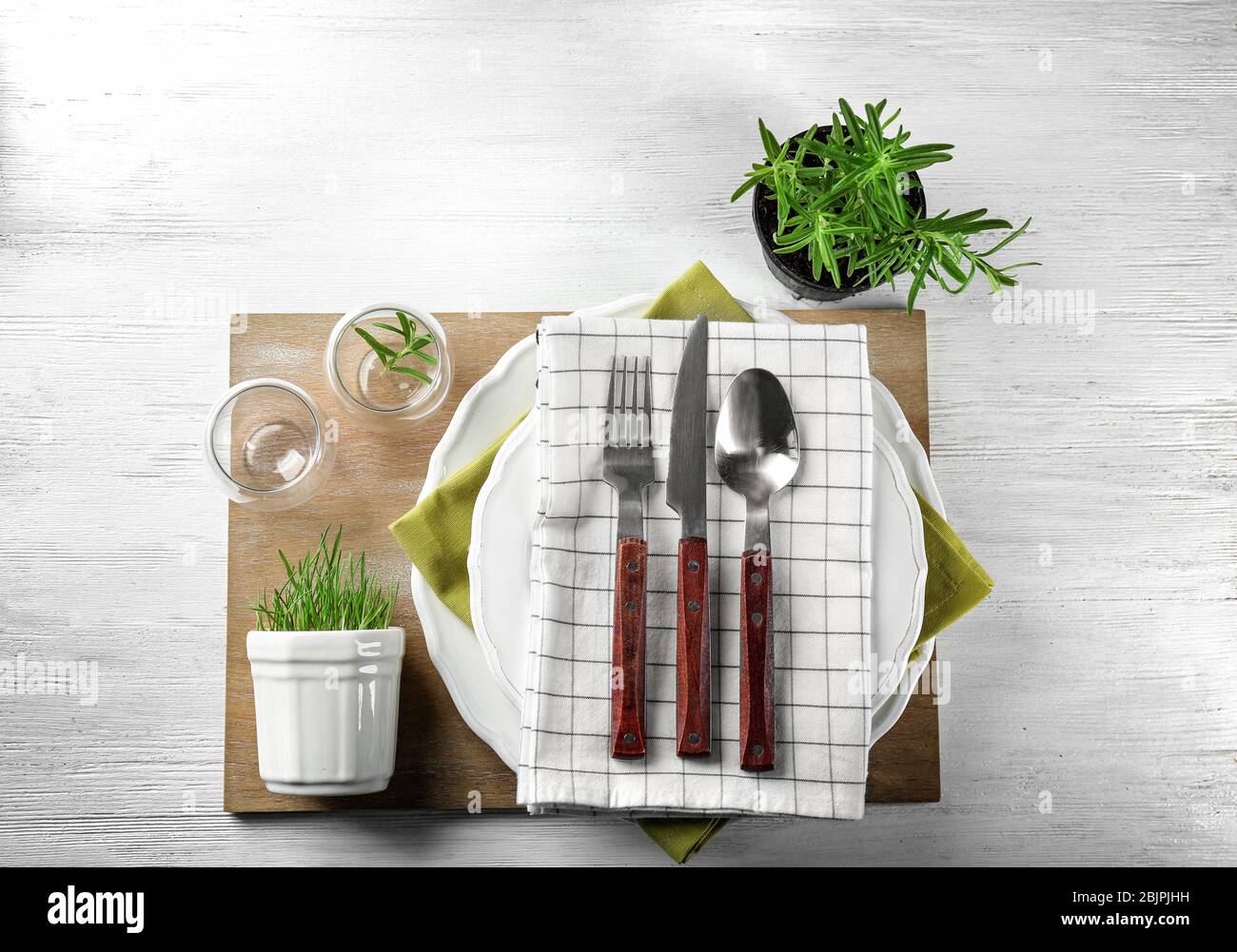Top view of table setting for dinner in vegetarian cafe Stock Photo - Alamy