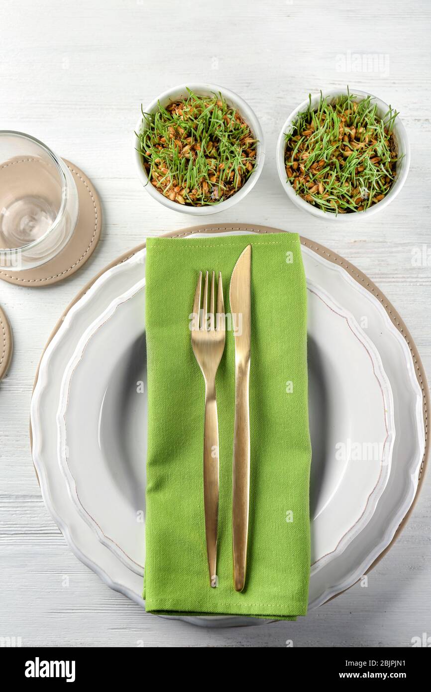 Top view of table setting for dinner in vegetarian cafe Stock Photo - Alamy