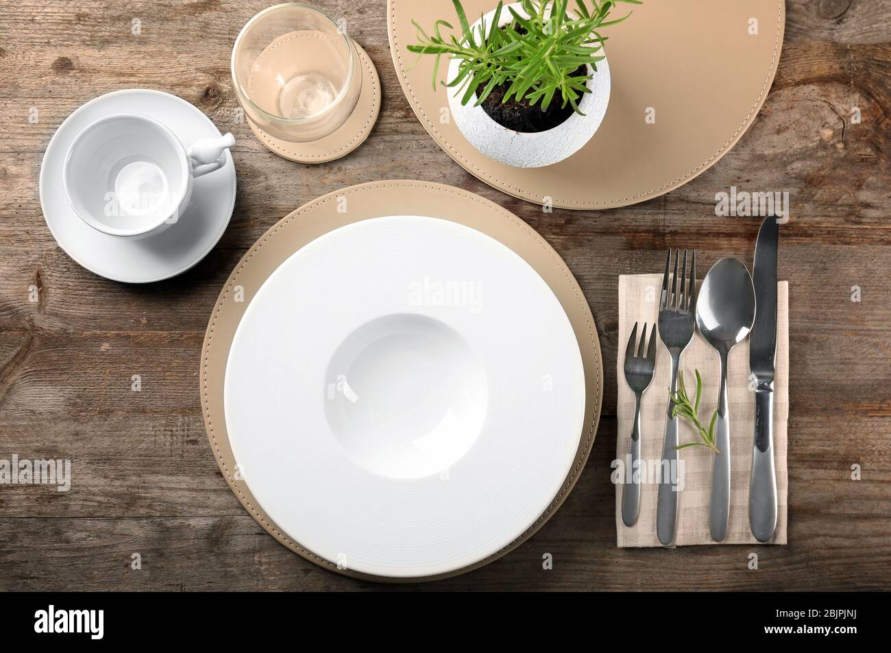 Top view of table setting for dinner in vegetarian cafe Stock Photo - Alamy