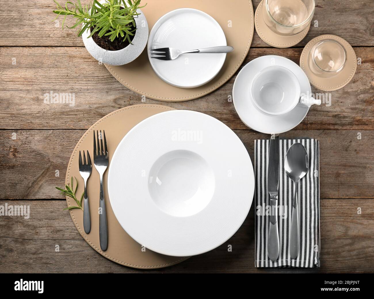 Top view of table setting for dinner in vegetarian cafe Stock Photo - Alamy