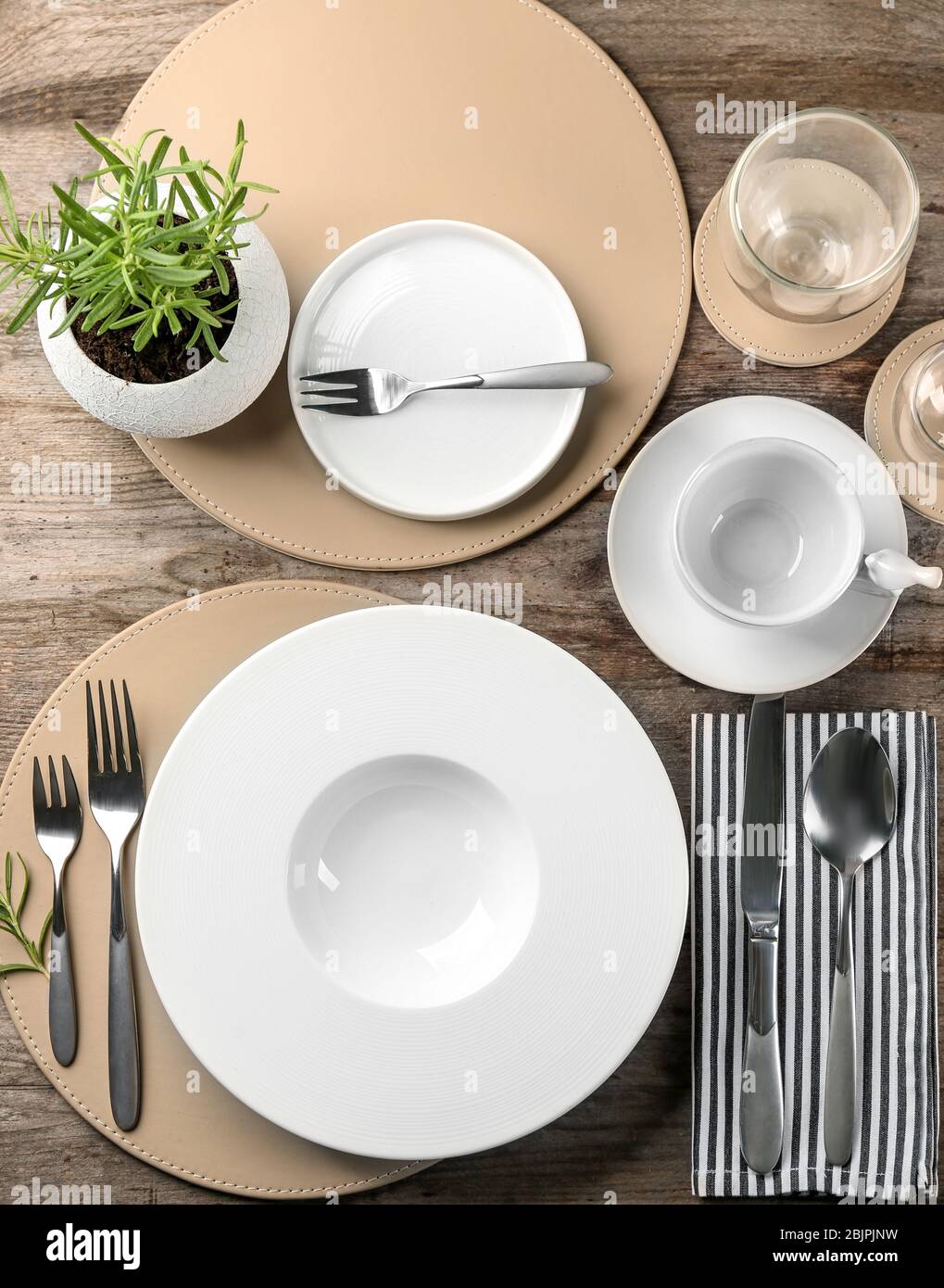 Top view of table setting for dinner in vegetarian cafe Stock Photo - Alamy