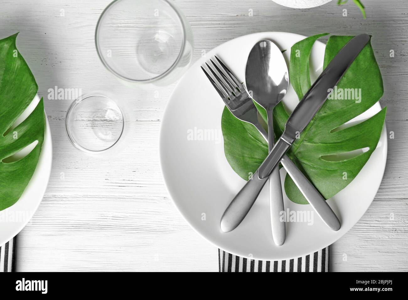 Top view of table setting for dinner in vegetarian cafe Stock Photo - Alamy