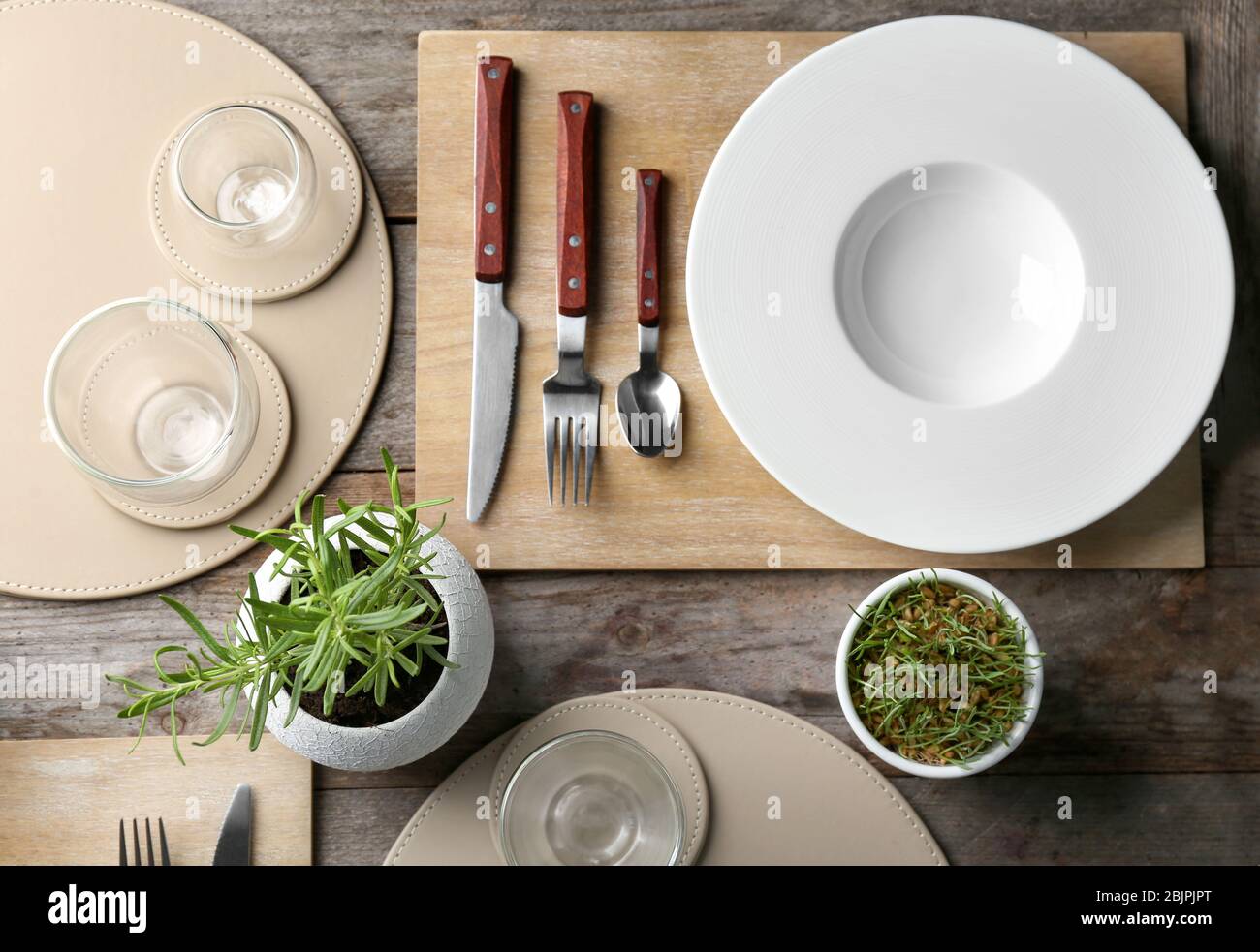 Top view of table setting for dinner in vegetarian cafe Stock Photo - Alamy