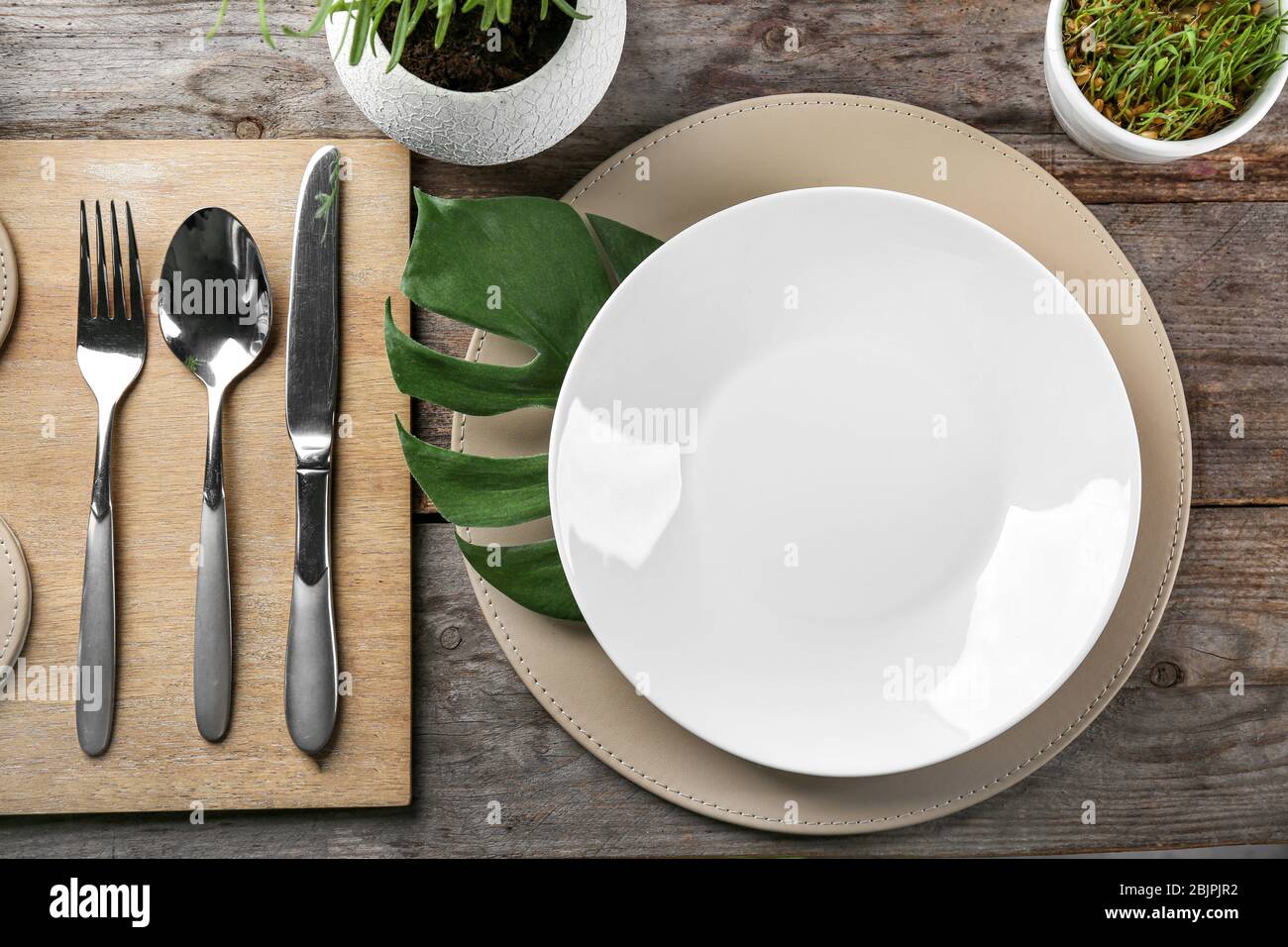 Top view of table setting for dinner in vegetarian cafe Stock Photo - Alamy