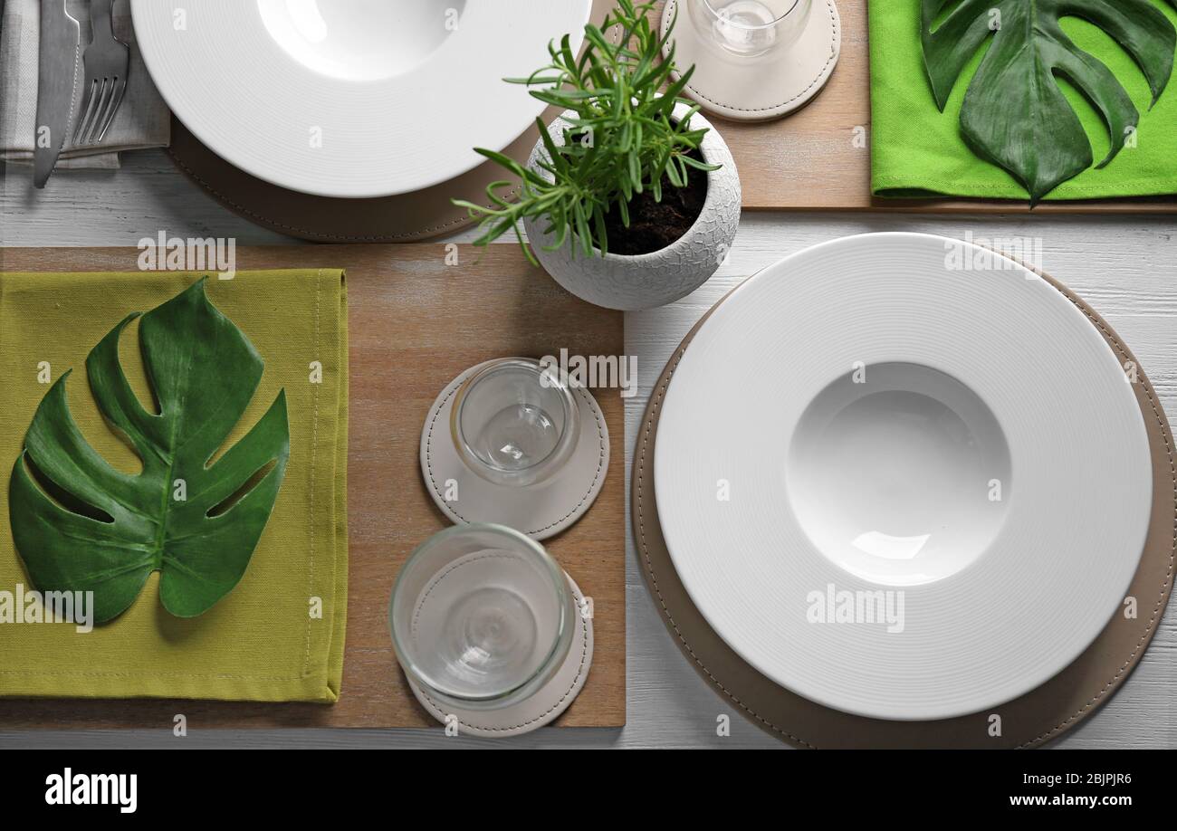 Top view of table setting for dinner in vegetarian cafe Stock Photo - Alamy