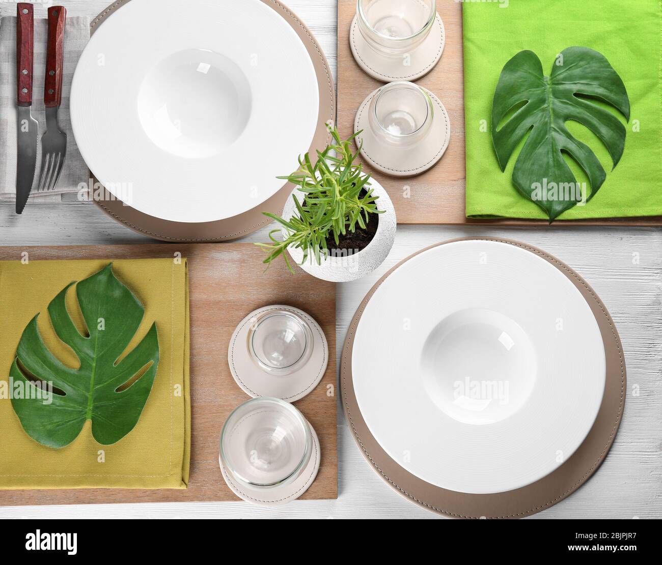 Top view of table setting for dinner in vegetarian cafe Stock Photo - Alamy