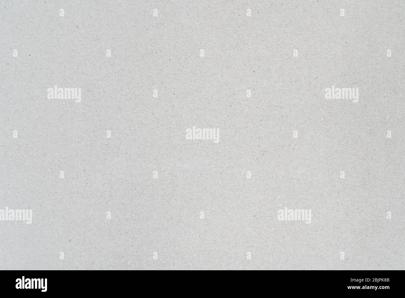 Gray color background from sheet of recycled cardboard. Close-up detail ...