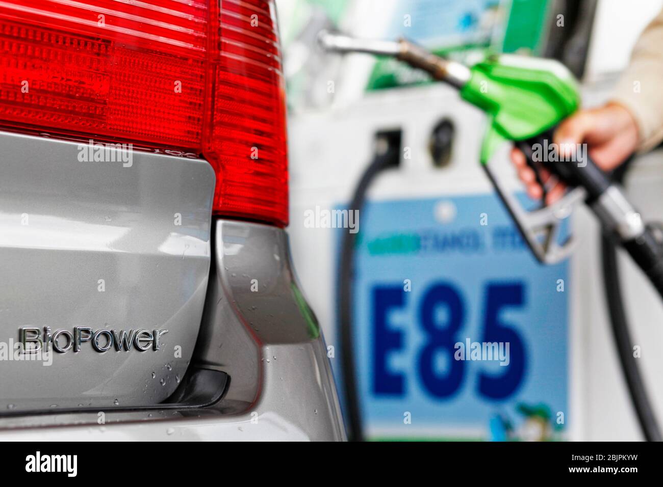 Ethanol E85 (alcohol) is being refueld into Saab 95 BioPower passenger ...