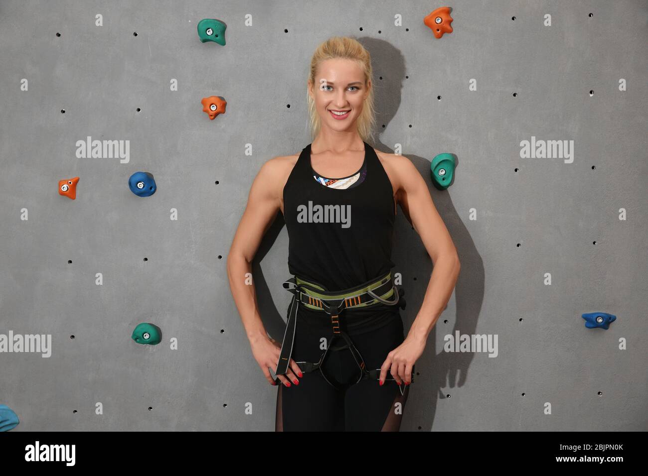 Woman rock climbing bouldering happy hi-res stock photography and ...