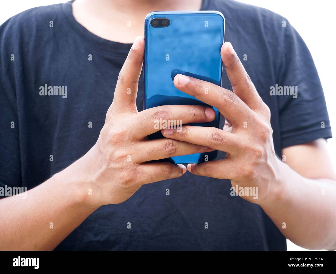 Young Indian man using smartphone Stock Photo - Alamy