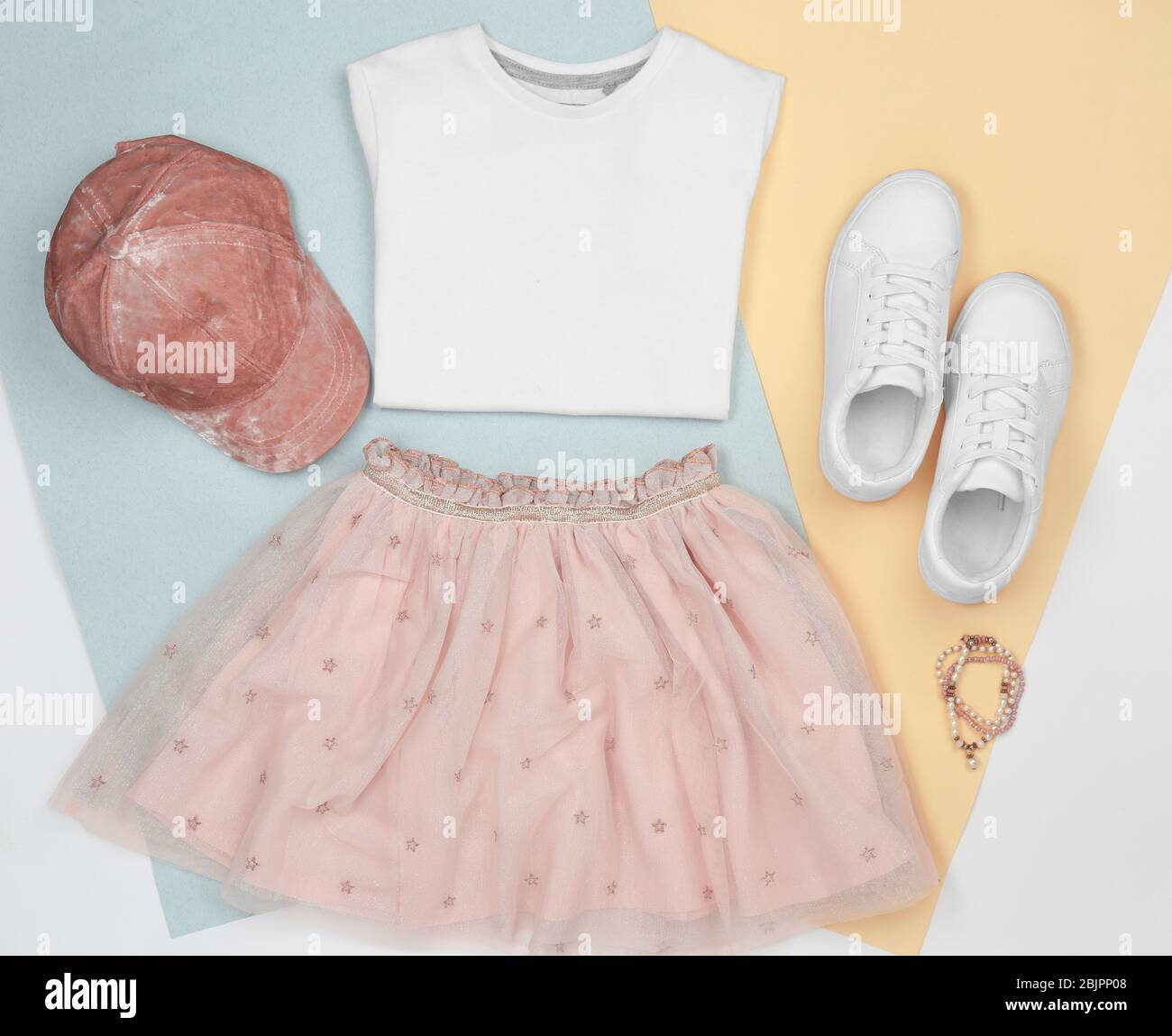 Set of child's clothes on color background Stock Photo - Alamy