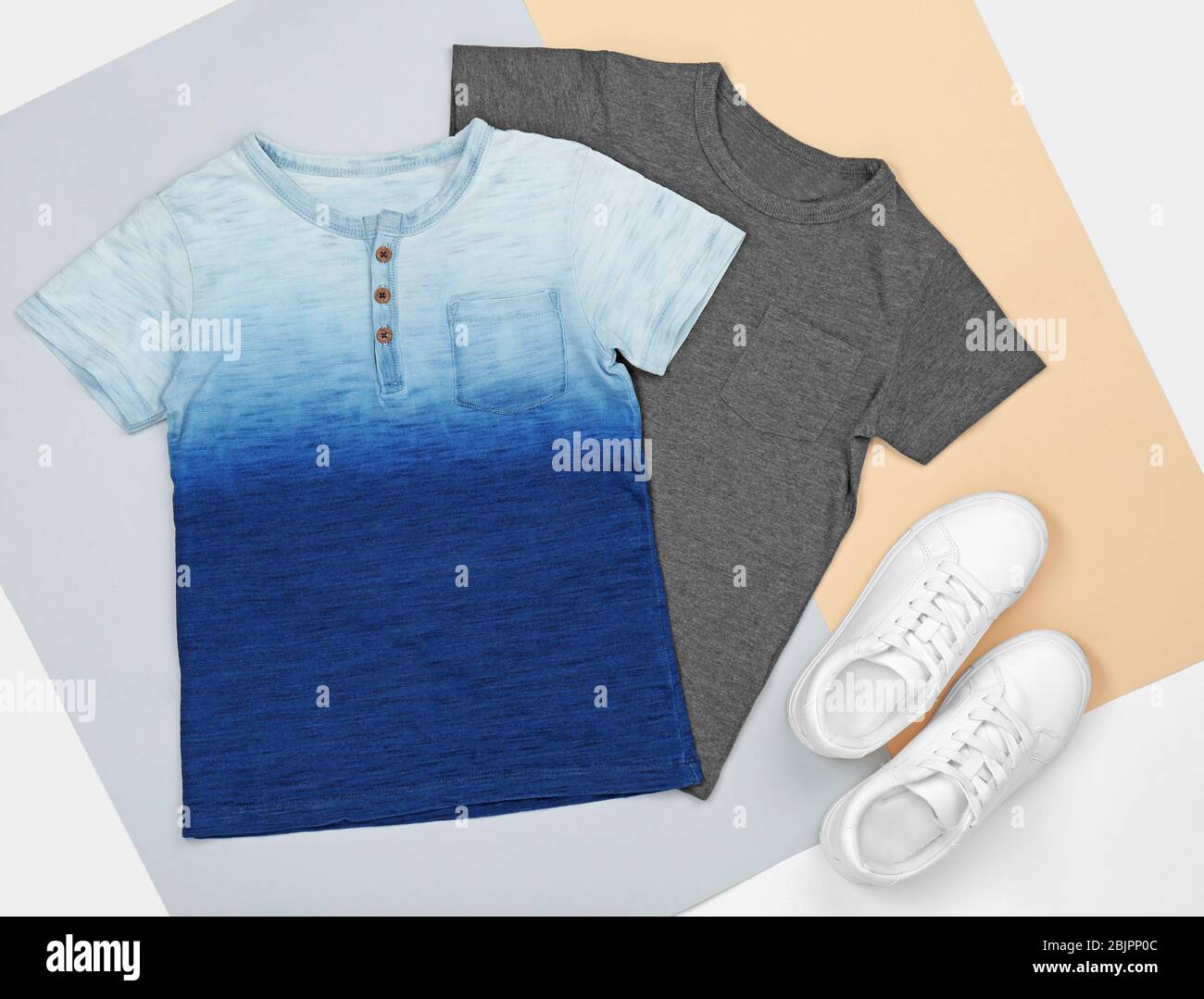 Set of child's clothes on color background Stock Photo - Alamy
