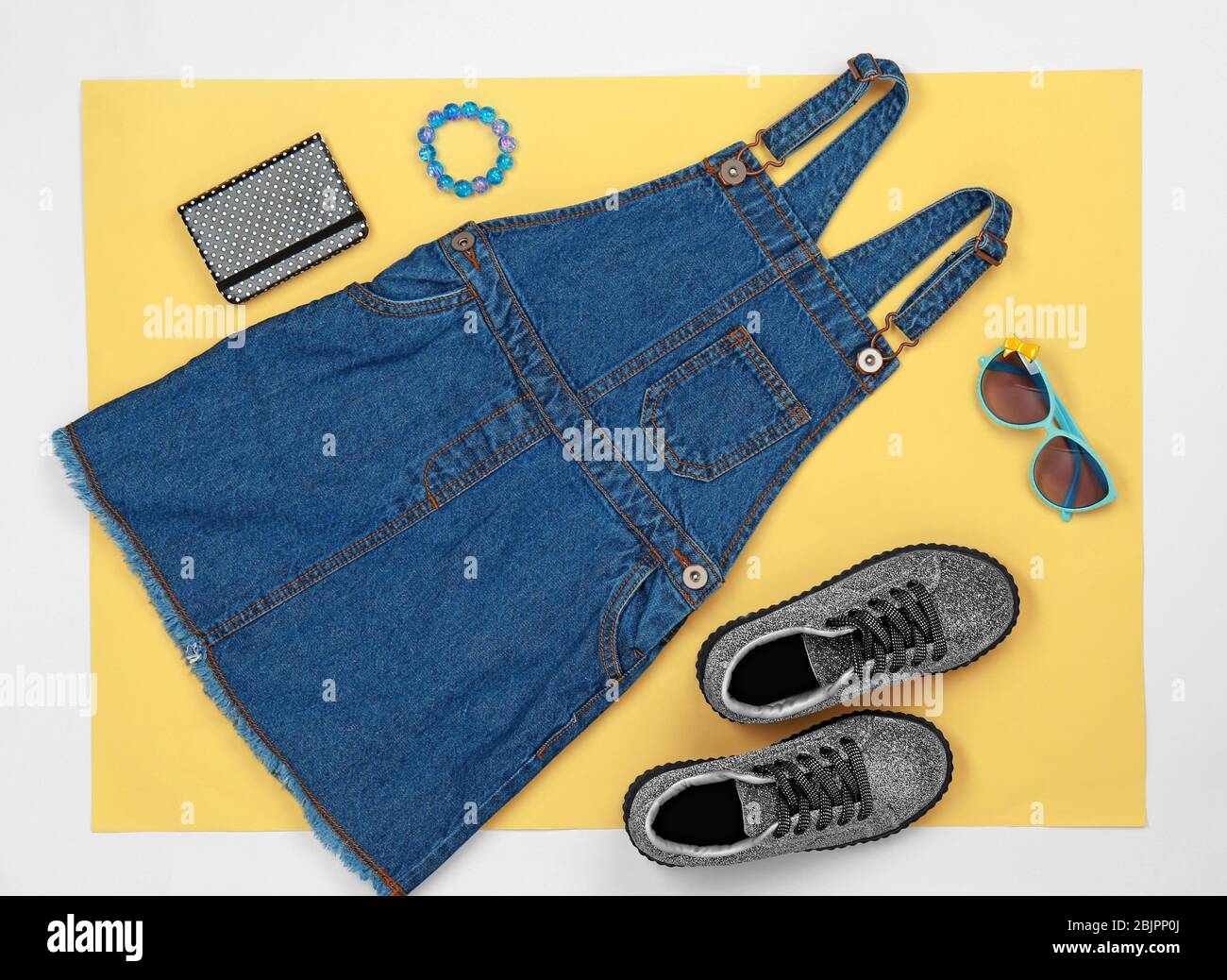 Set of child's clothes on color background Stock Photo - Alamy
