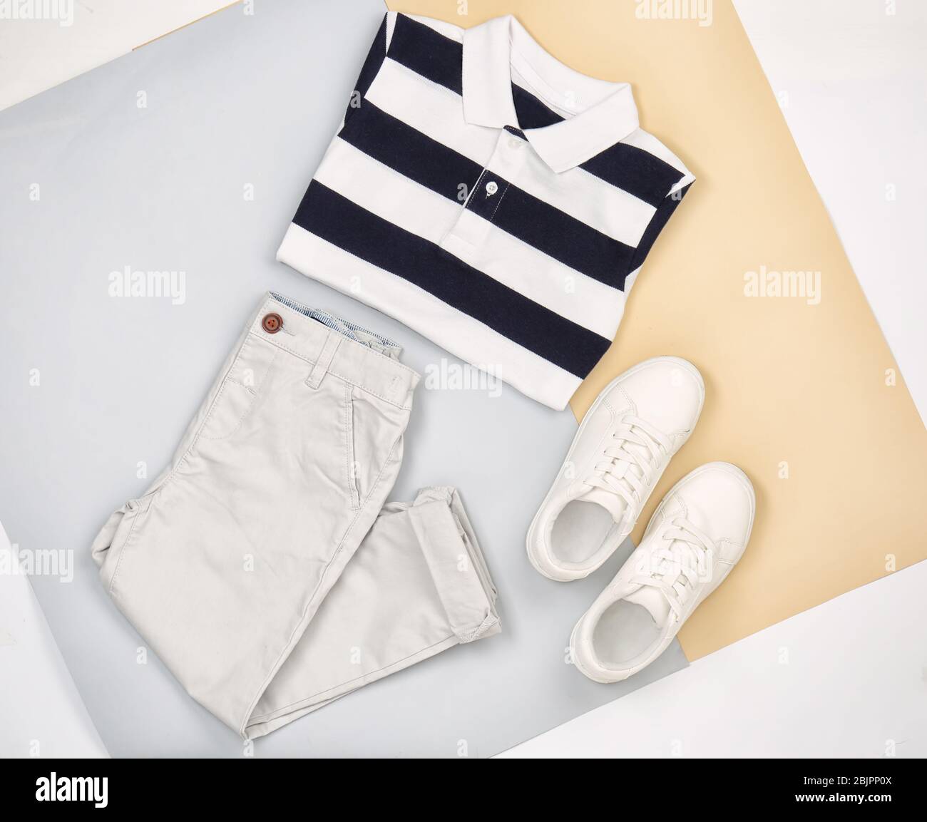Set of child's clothes on color background Stock Photo - Alamy