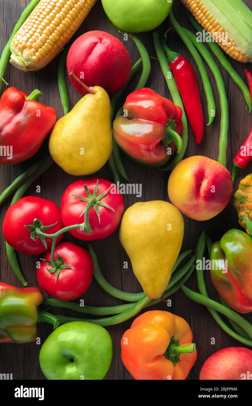 Composition of different fruits and vegetables on wooden background ...