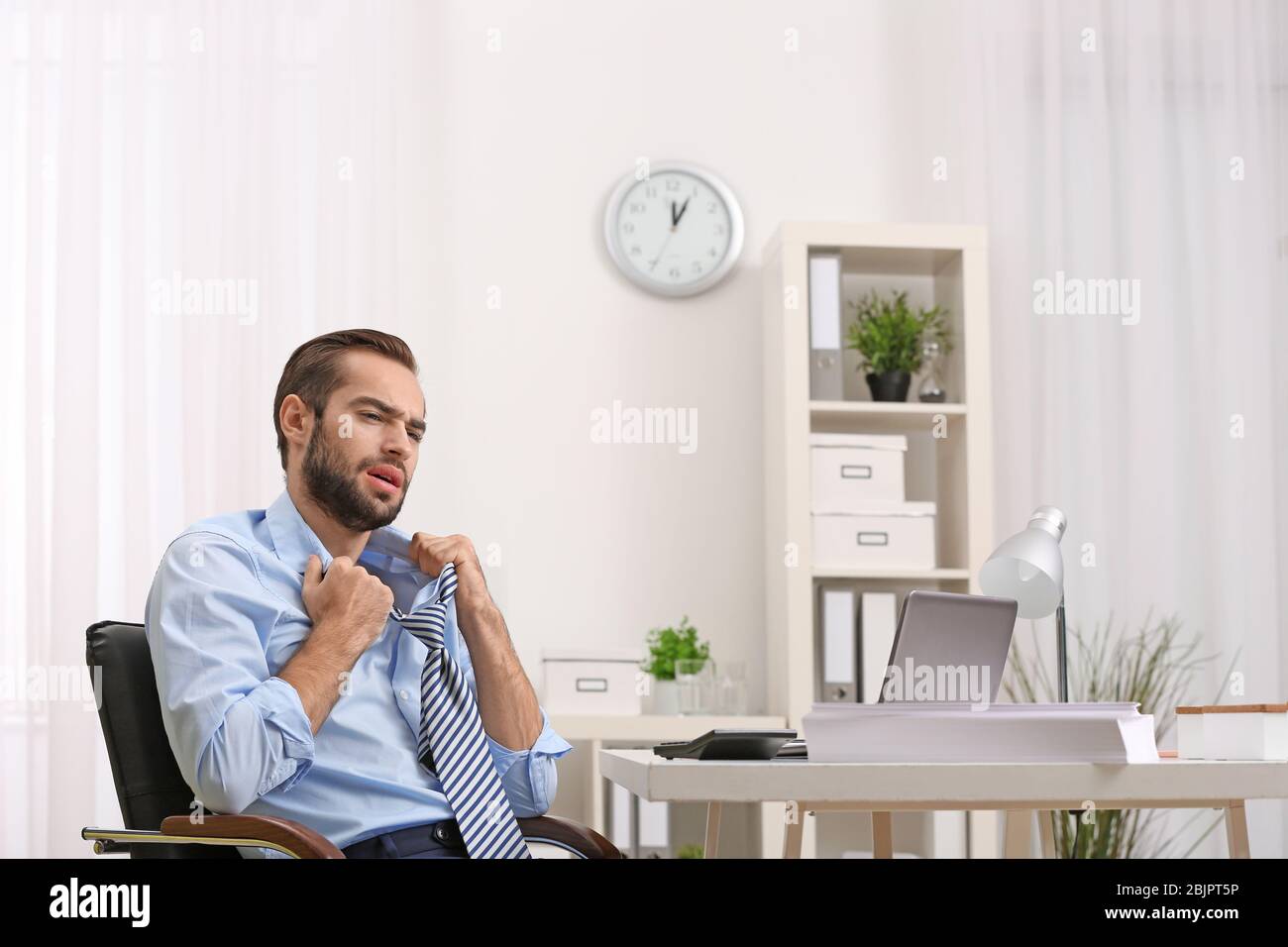 Man sweating in office hi-res stock photography and images - Alamy