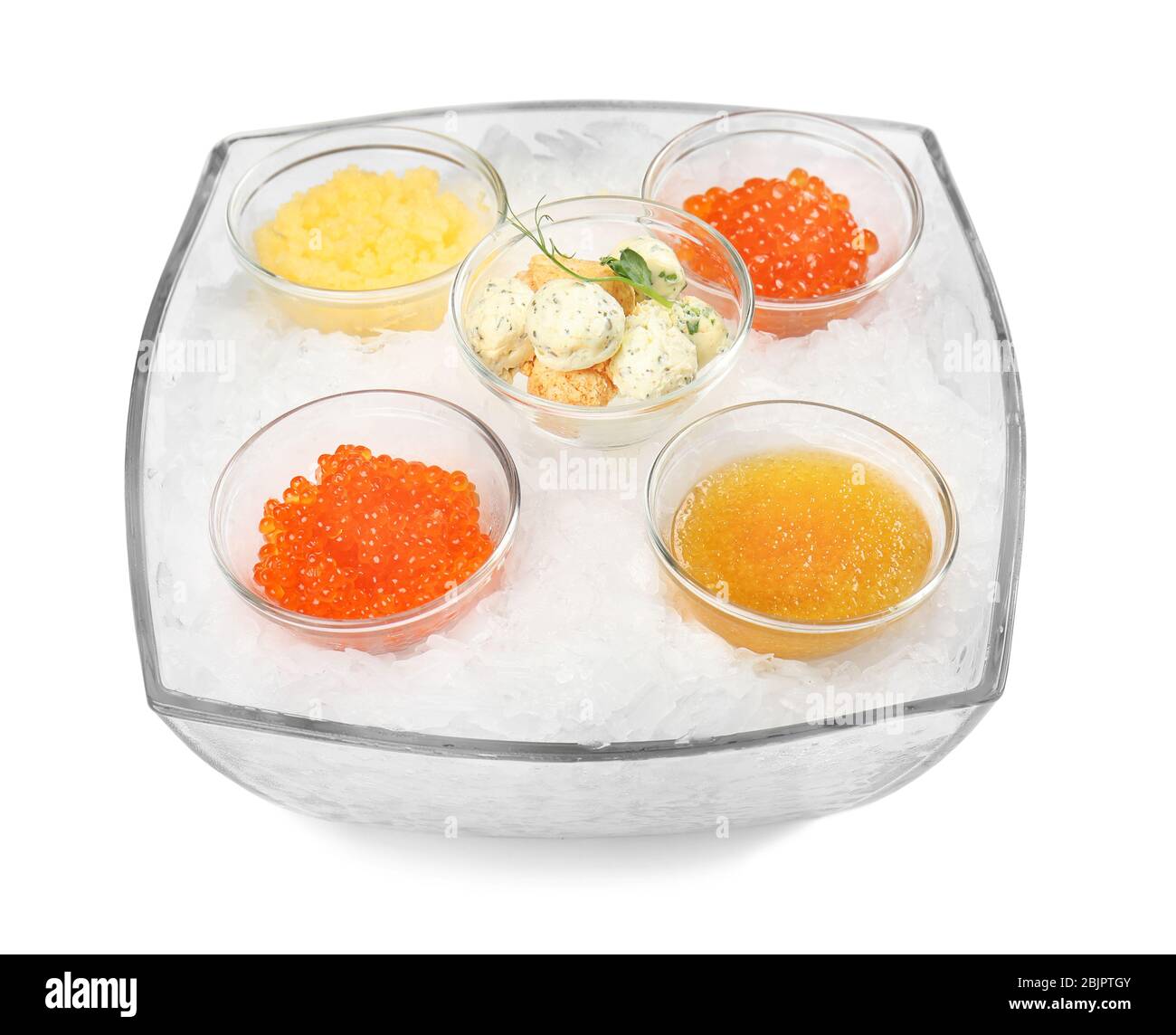 Glass bowl with various caviar on white background Stock Photo - Alamy