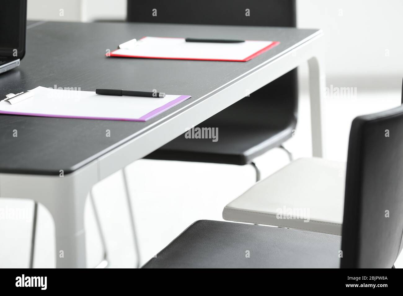 Clipboards with documents on table in office Stock Photo - Alamy