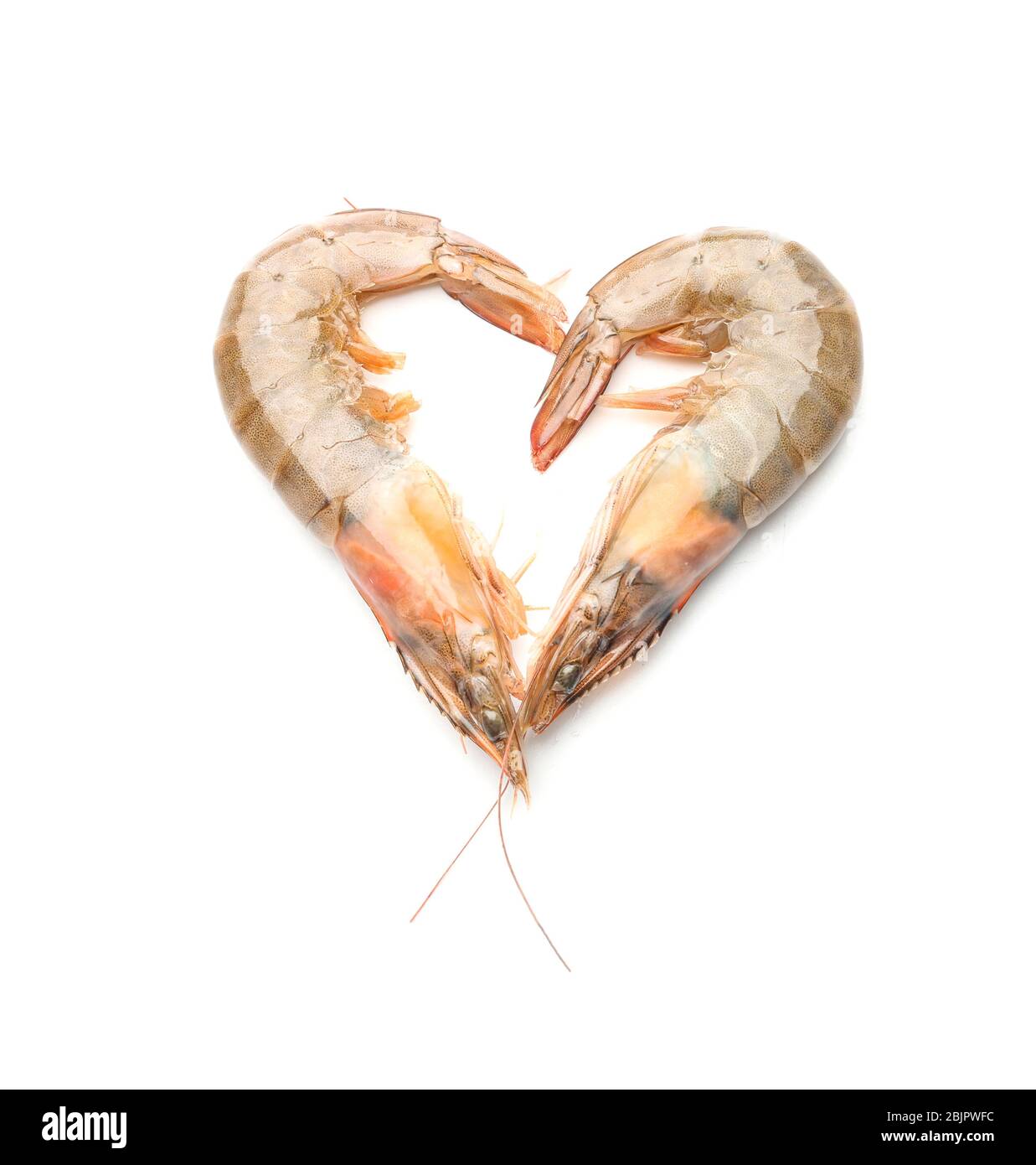 Heart shape made with fresh shrimps on white background Stock Photo - Alamy