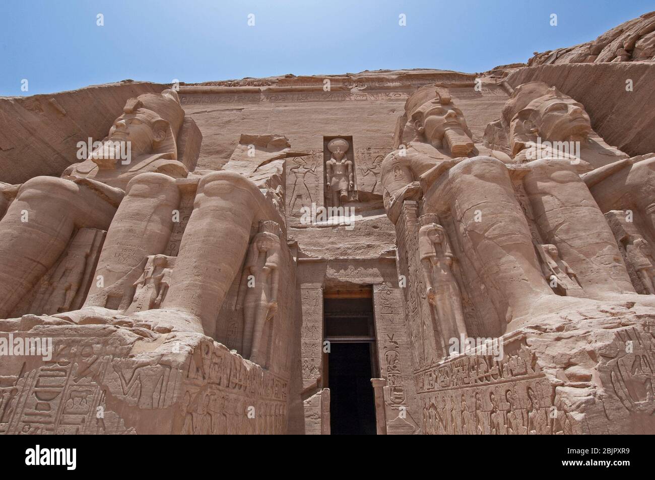Exterior entrance to ancient egyptian temple of Ramses II in Abu Simbel ...