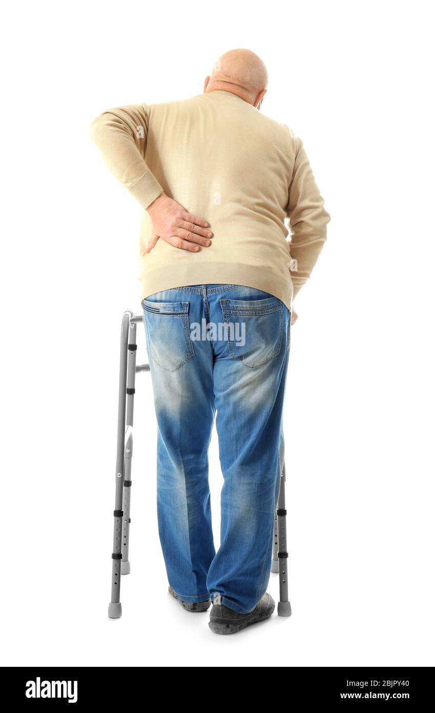 Elderly man with walking frame on white background Stock Photo - Alamy