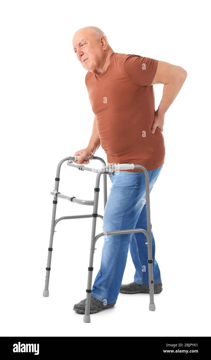 Elderly man with walking frame on white background Stock Photo - Alamy