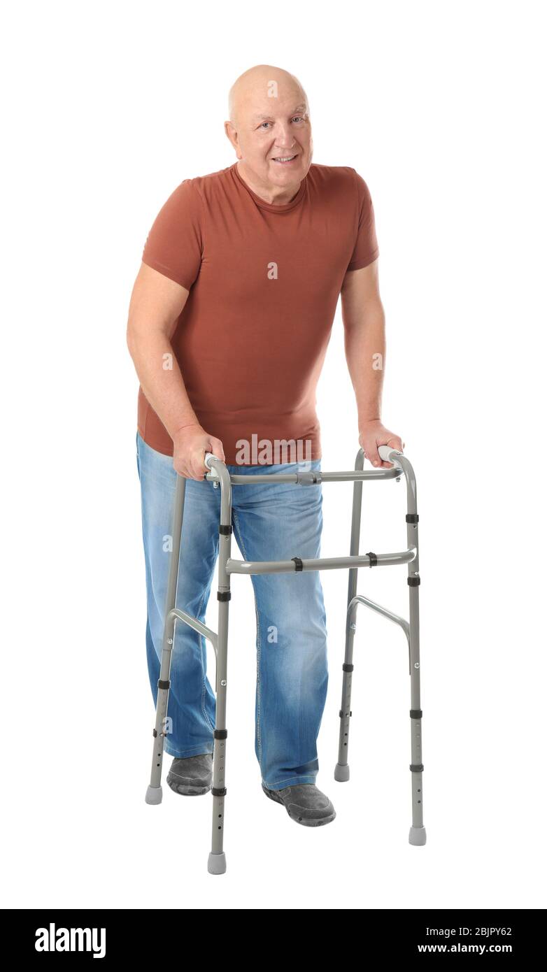 Elderly man with walking frame on white background Stock Photo - Alamy