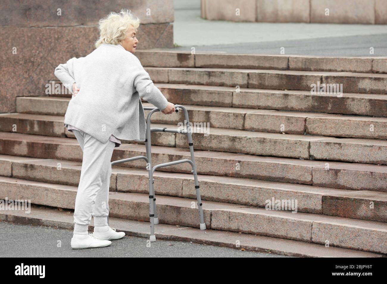 Elderly walker stairs hi-res stock photography and images - Alamy