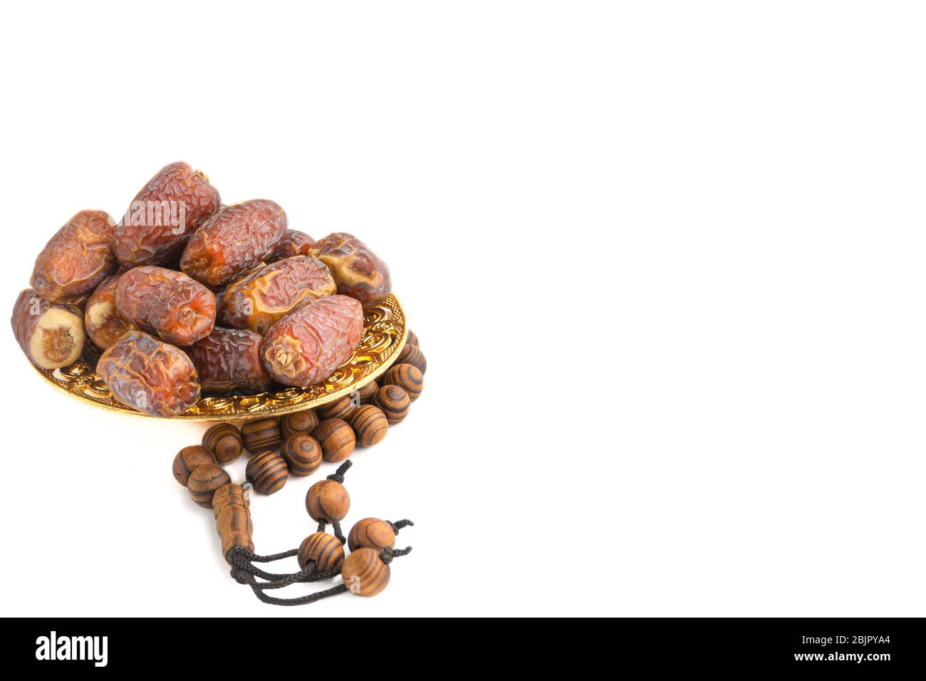 Date fruits or dry dates isolated on white background.Ramadan Kareem ...