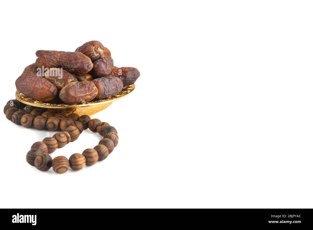 Date fruits or dry dates isolated on white background.Ramadan Kareem ...