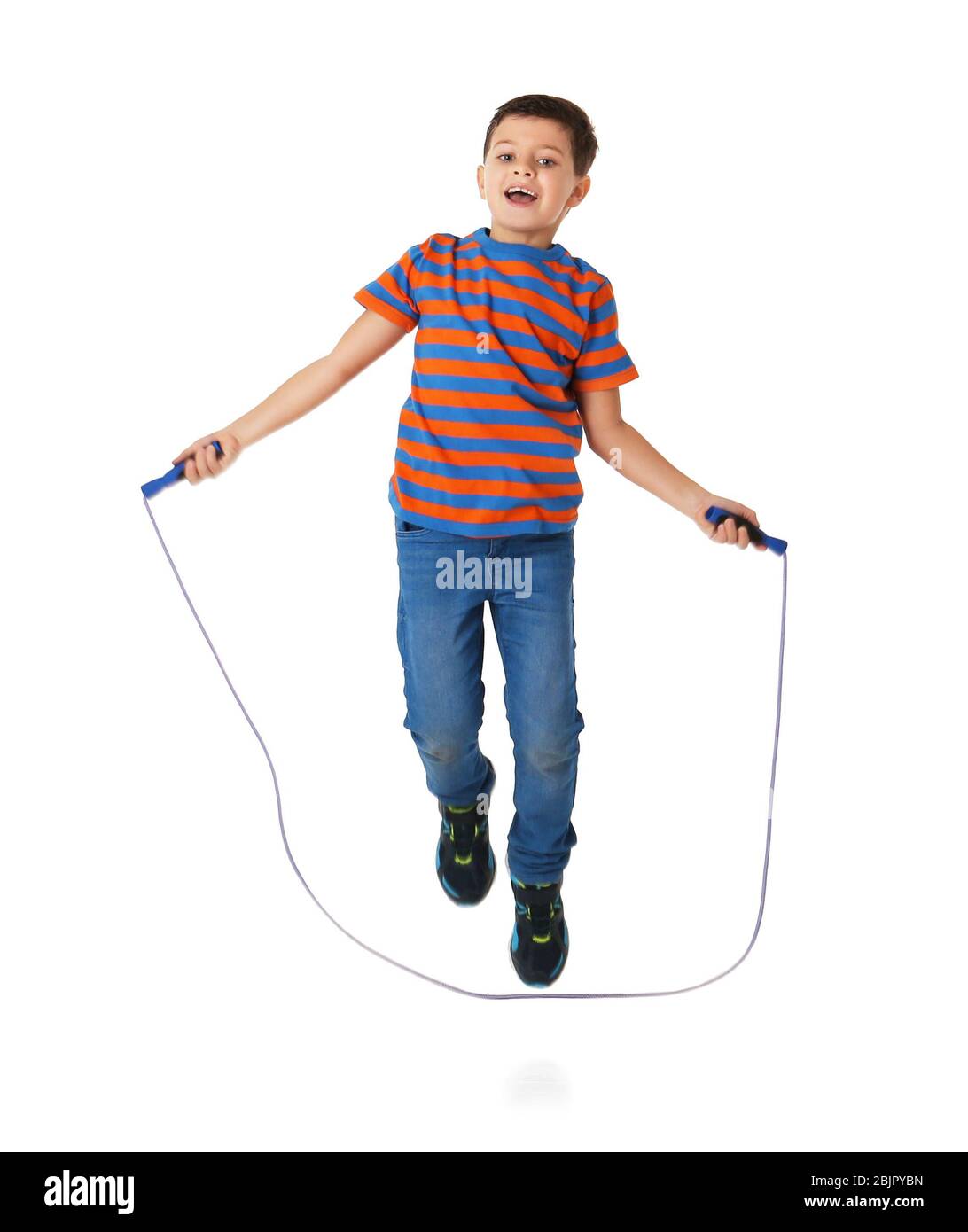 Cute little boy playing with jumping rope on white background Stock ...